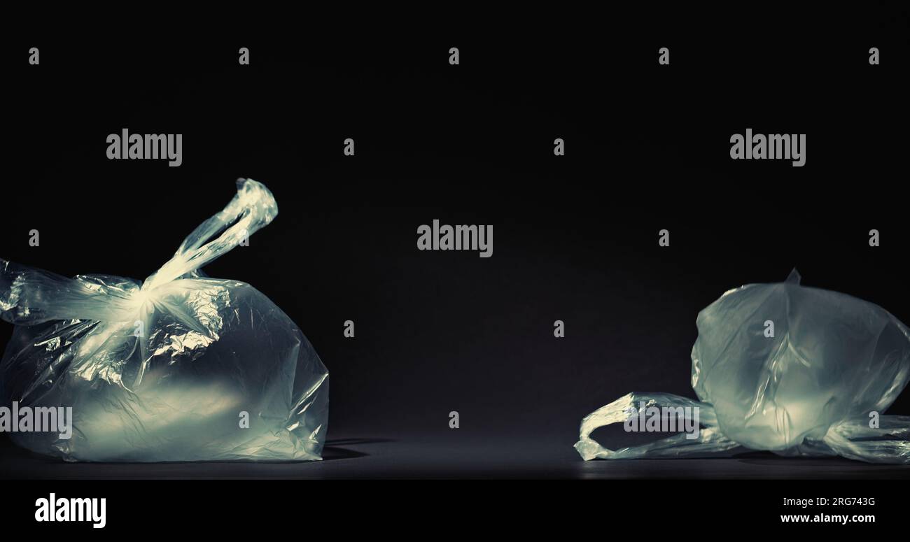 Plastic contamination waste management used bags Stock Photo - Alamy