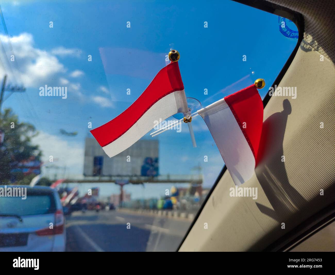 the Indonesian national flag in the car. Indonesian Independence day ...