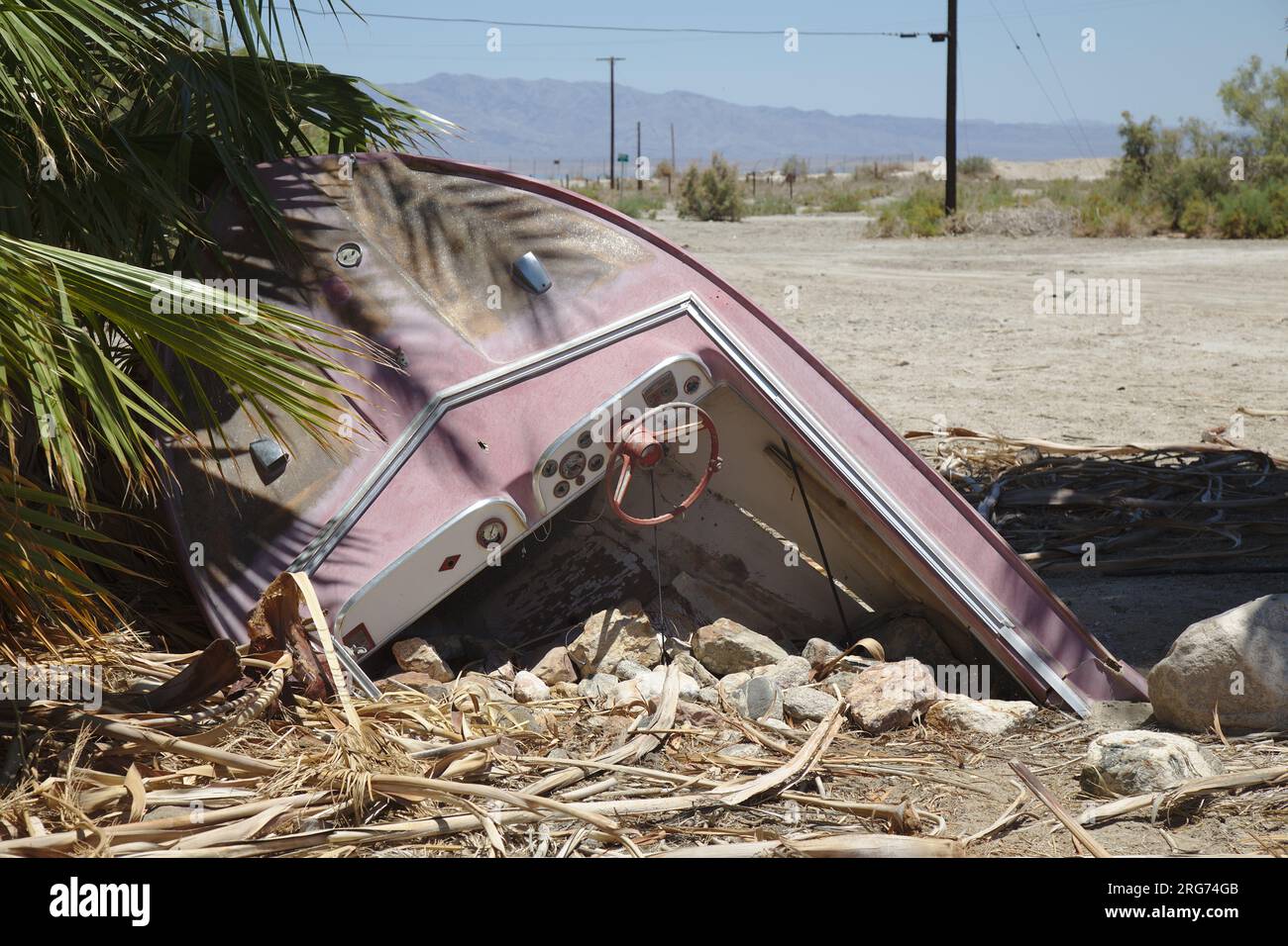 Pink speed boat buried in the sand at Salton Sea in California 2015 ...