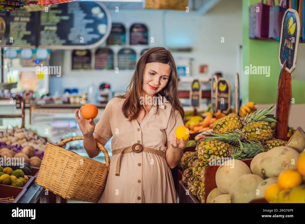 A glowing pregnant woman after forty makes a healthy choice as she ...