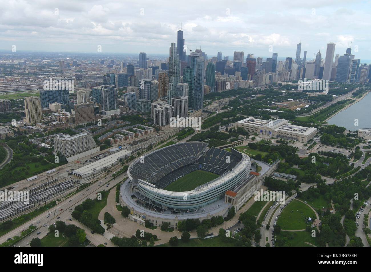 A general overall aerial view of Soldier Field and downtown skyline ...