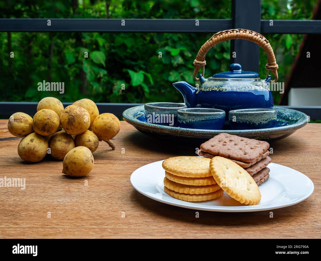 Teatime with hot chinese tea in beautiful design blue set, round and ...
