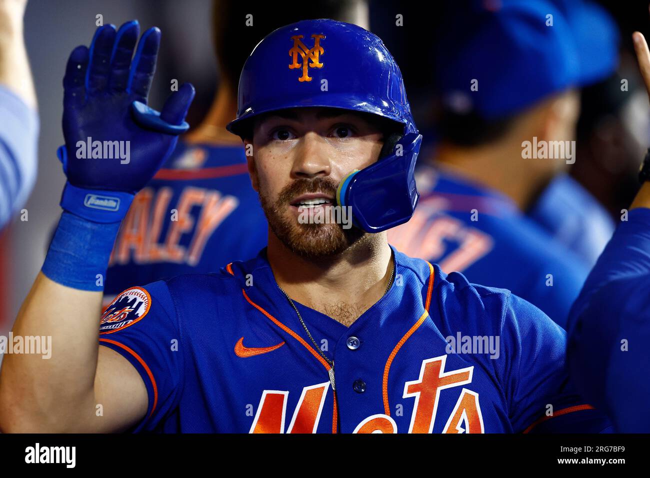 New York Mets shortstop Danny Mendick (15) is congratulated after he ...