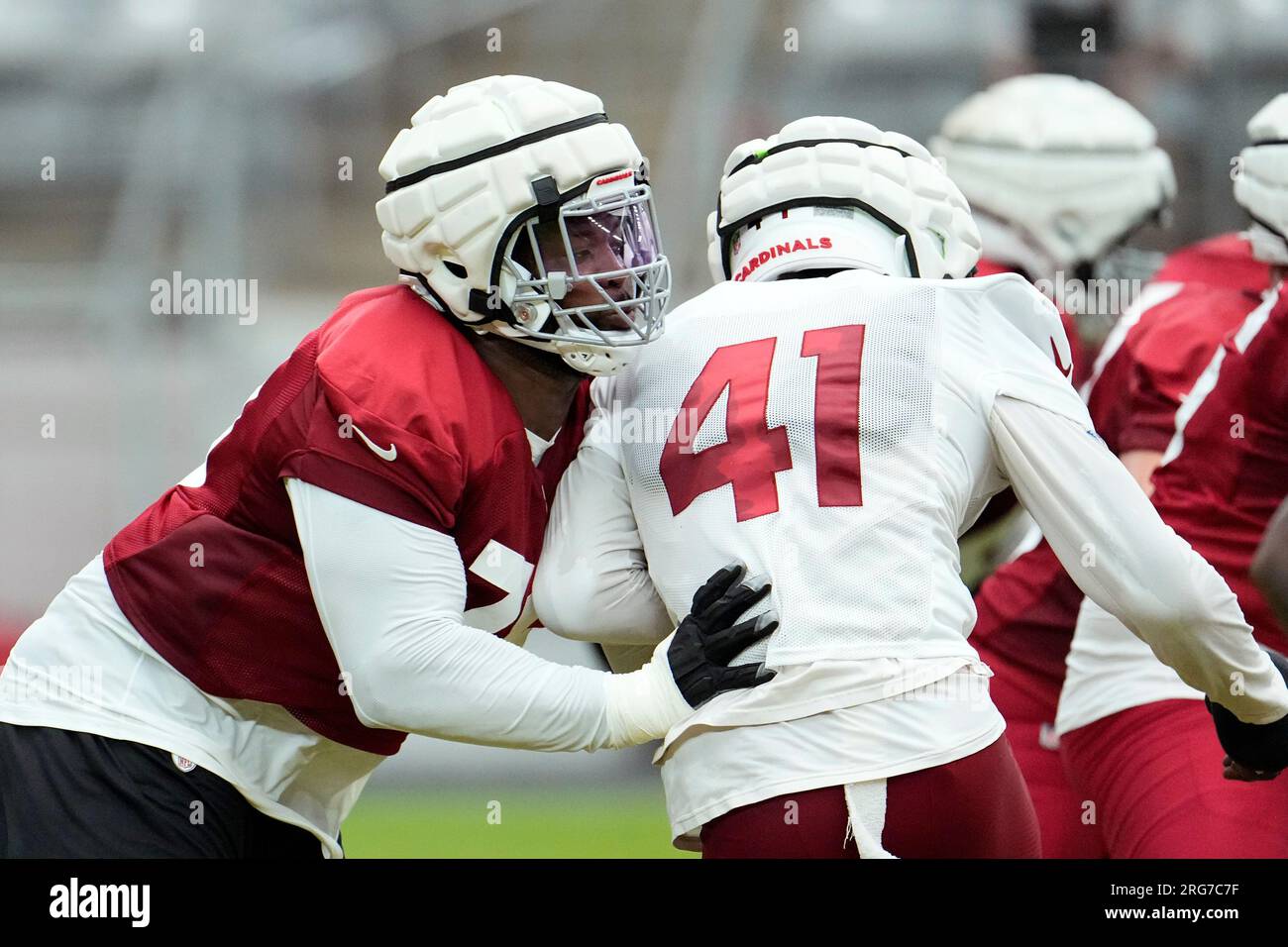 Arizona Cardinals offensive tackle Josh Jones, left, blocks Cardinals ...