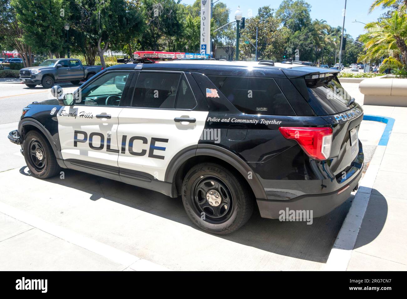 black and white police cruiser car in upscale beverly hills los angeles ...