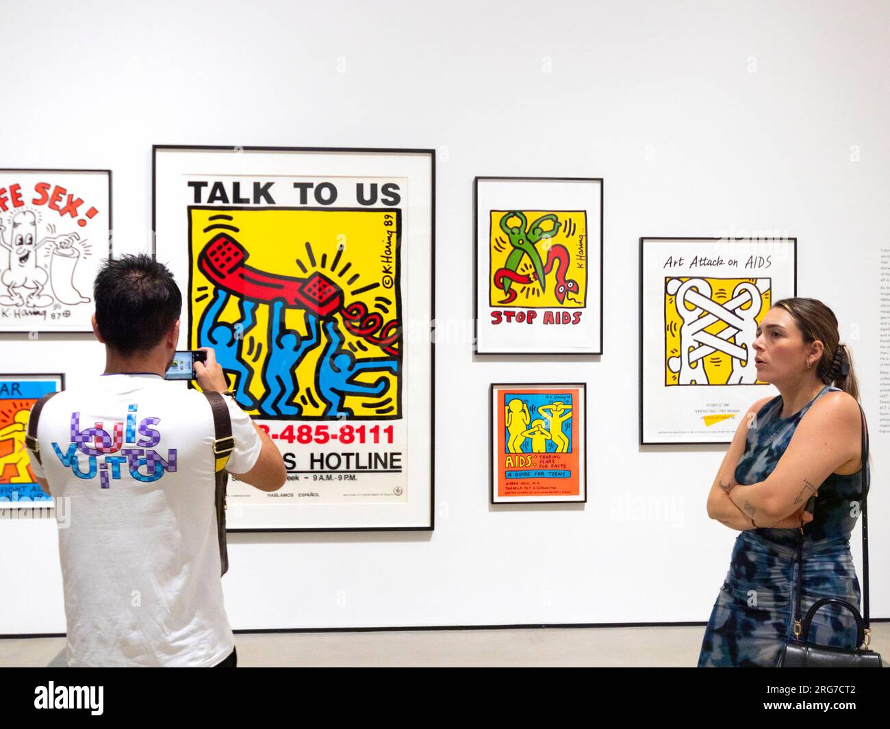 man photographs iconic paintings by gay artist Keith Haring who died of ...