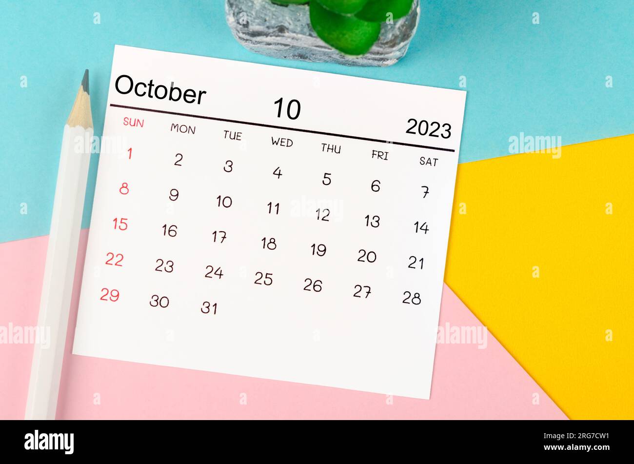 October 2023 Monthly calendar for 2023 year with pen on beautiful ...