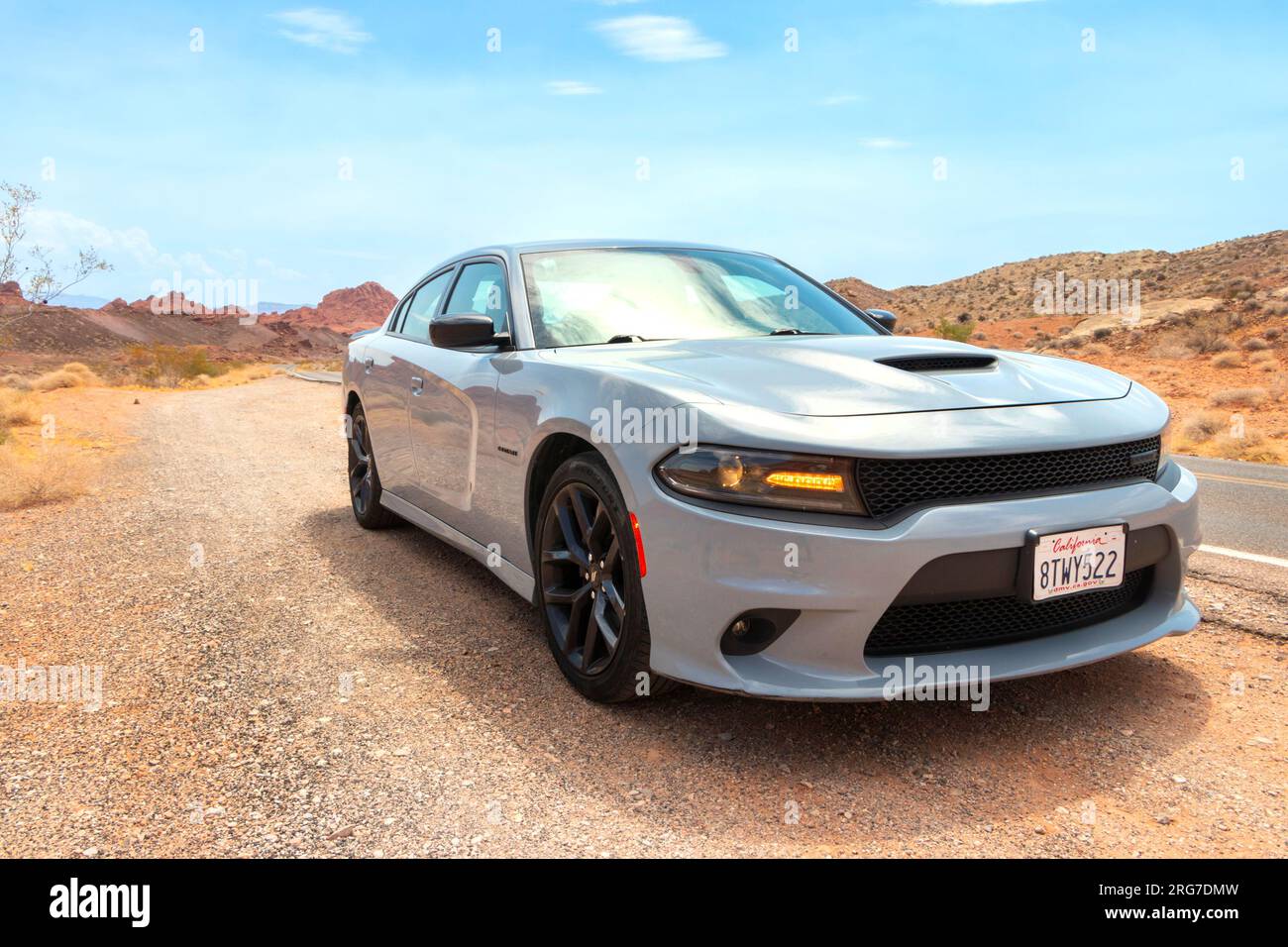 front 3/4 view grey 2023 Dodge charger Hemi sports muscle car in fire ...