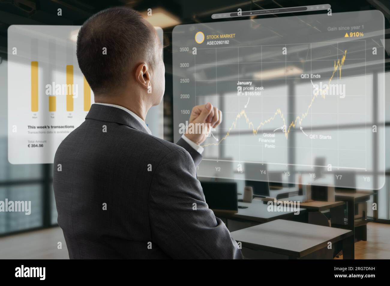 Asian businessman in the office interacting to augmented reality or ... Asian businessman in the office interacting to augmented reality or ...