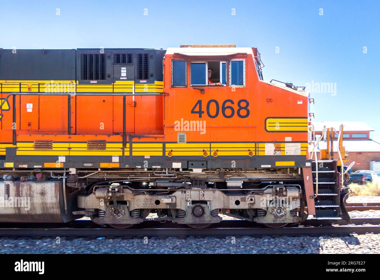 orange freight train engine locomotive power unit BNSF (Burlington North Santa Fe) railroad 4068 ...