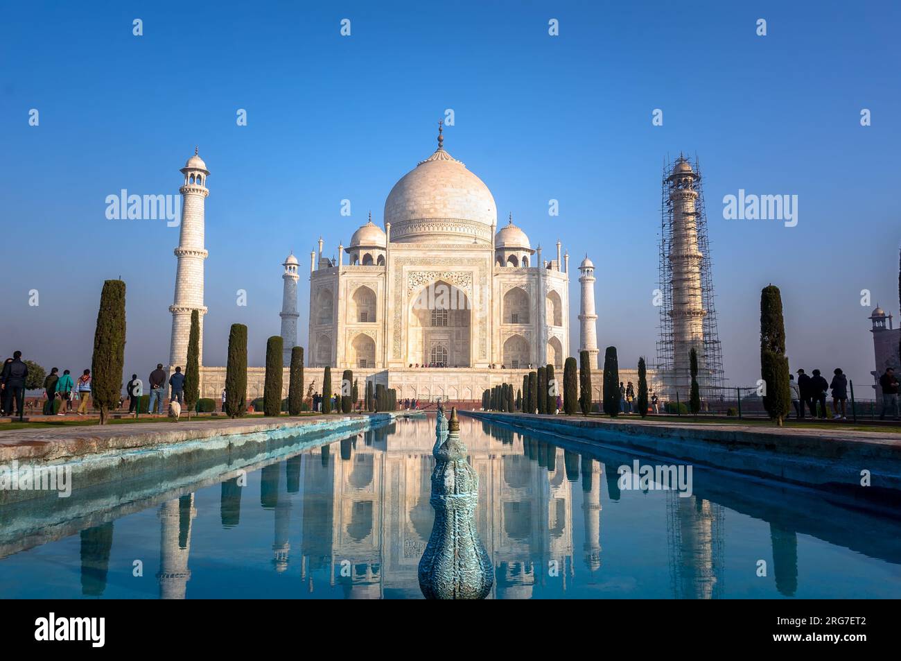 A perspective view on Taj-Mahal mausoleum with reflection in water ...