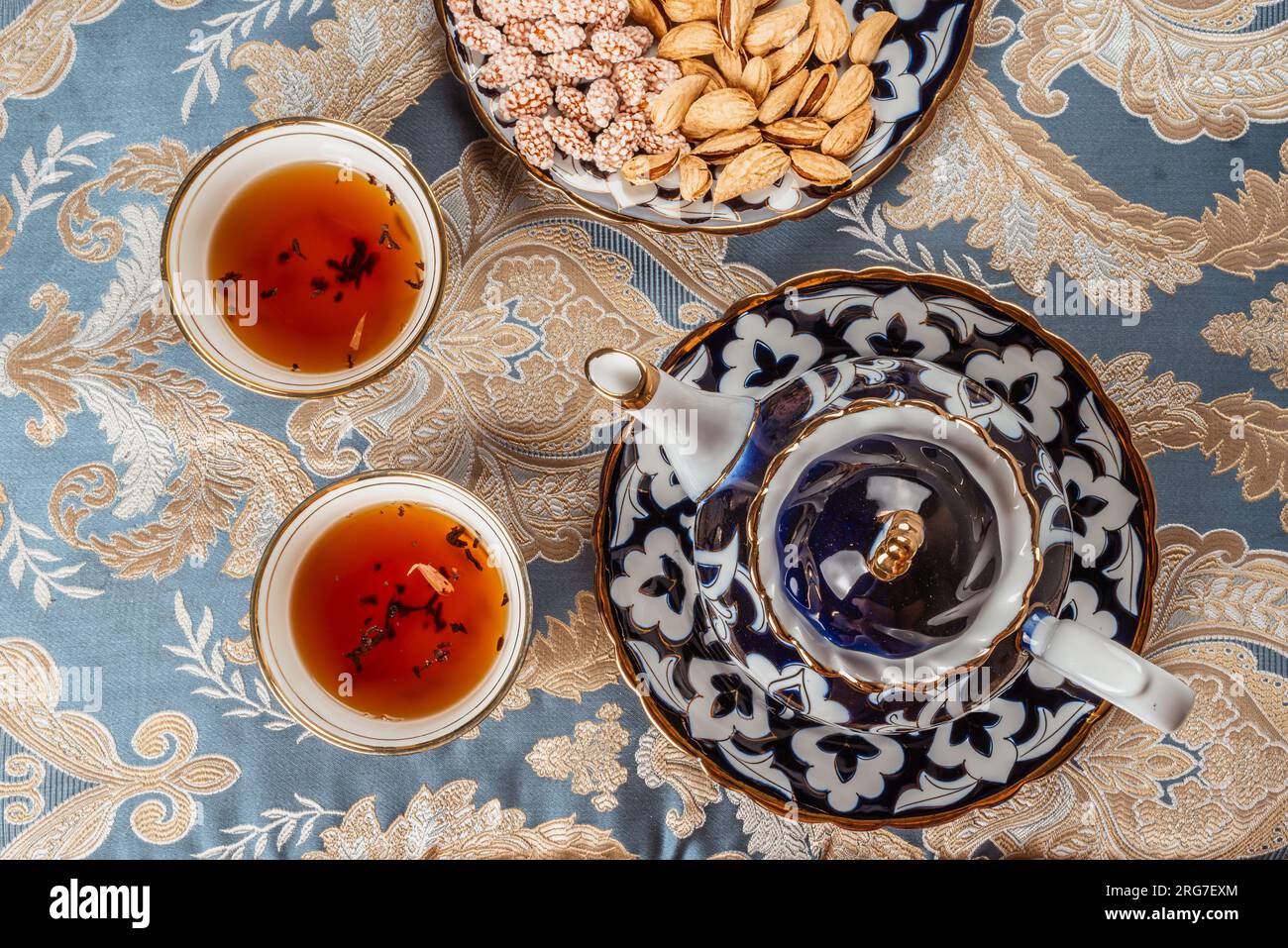 traditional uzbek tea with nuts Stock Photo - Alamy
