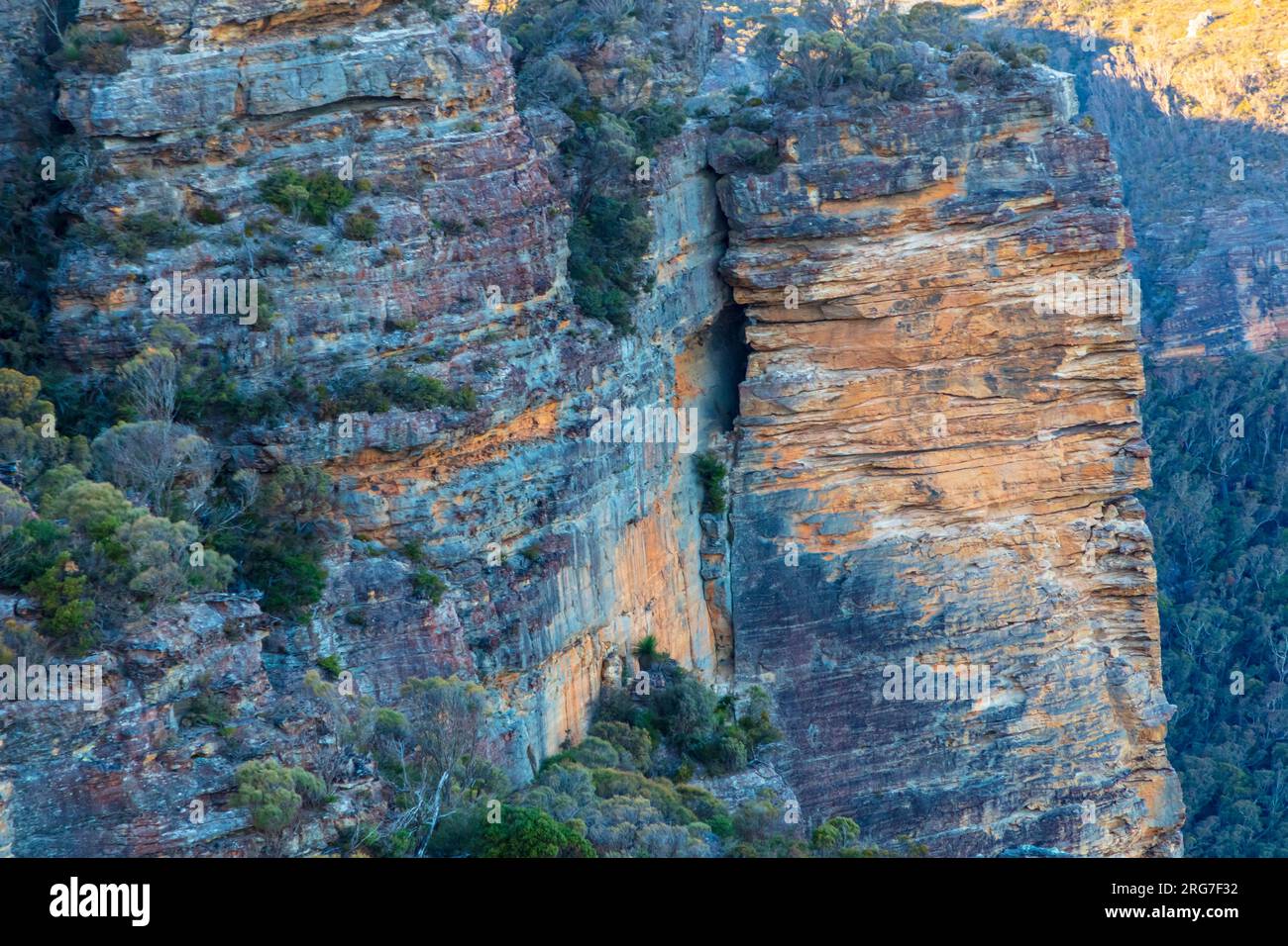 Photograph of the rugged and rocky cliff face of mountains the Megalong ...