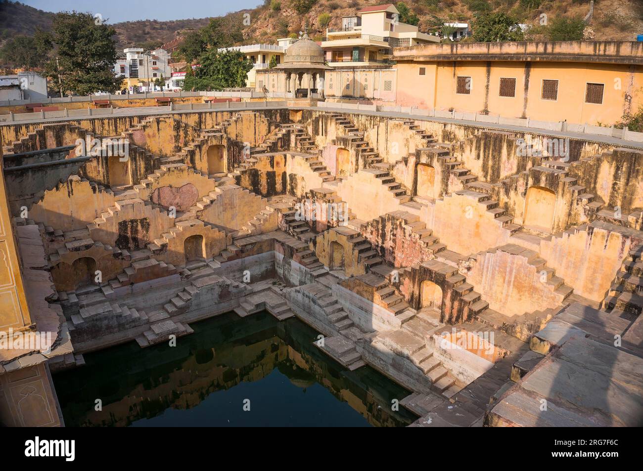 Old ancient Indian deep well with lots of steps near the amber fort ...