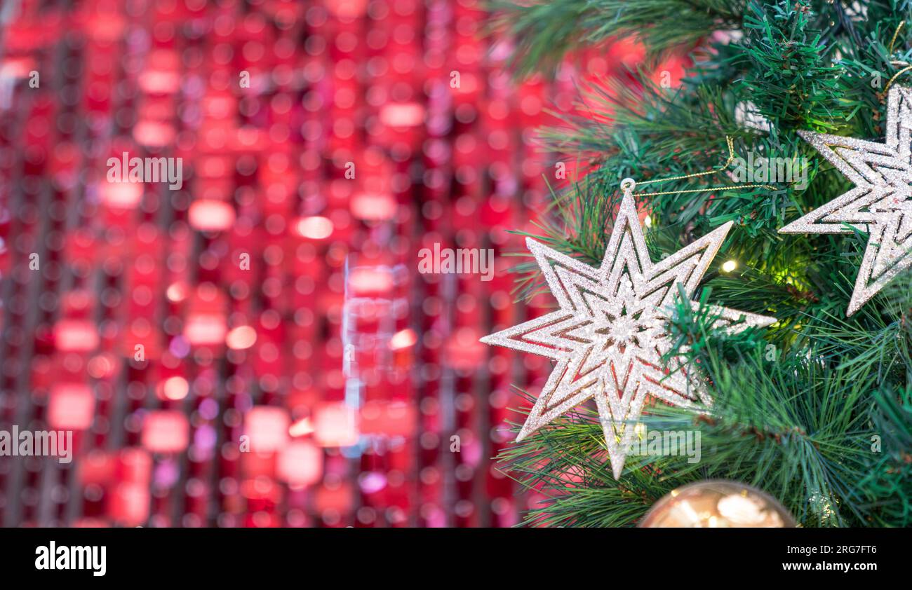 Hanging christmas star ornaments hi-res stock photography and images ...