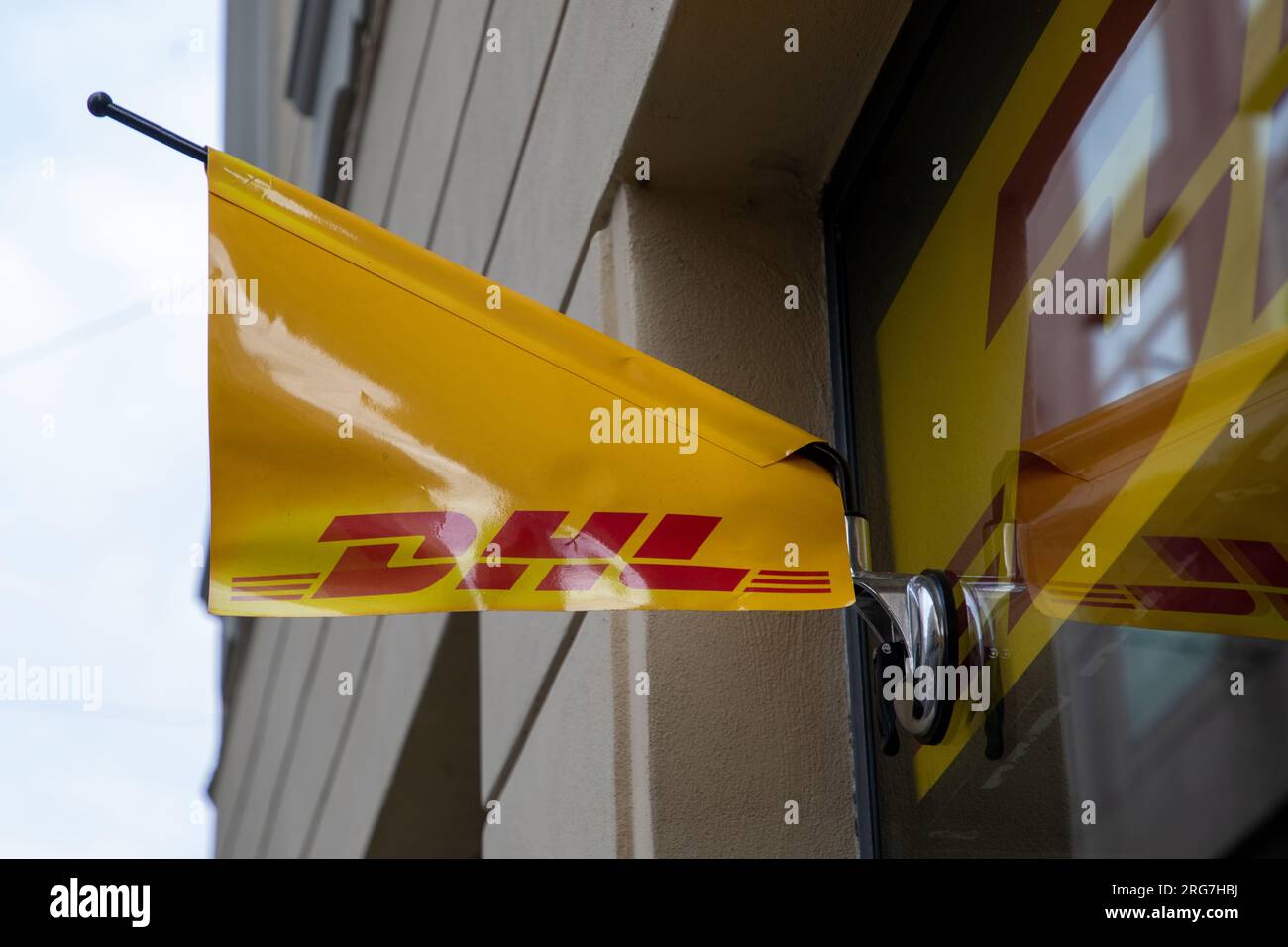 Milan , Italy - 08 07 2023 : DHL logo brand and sign on yellow delivery ...