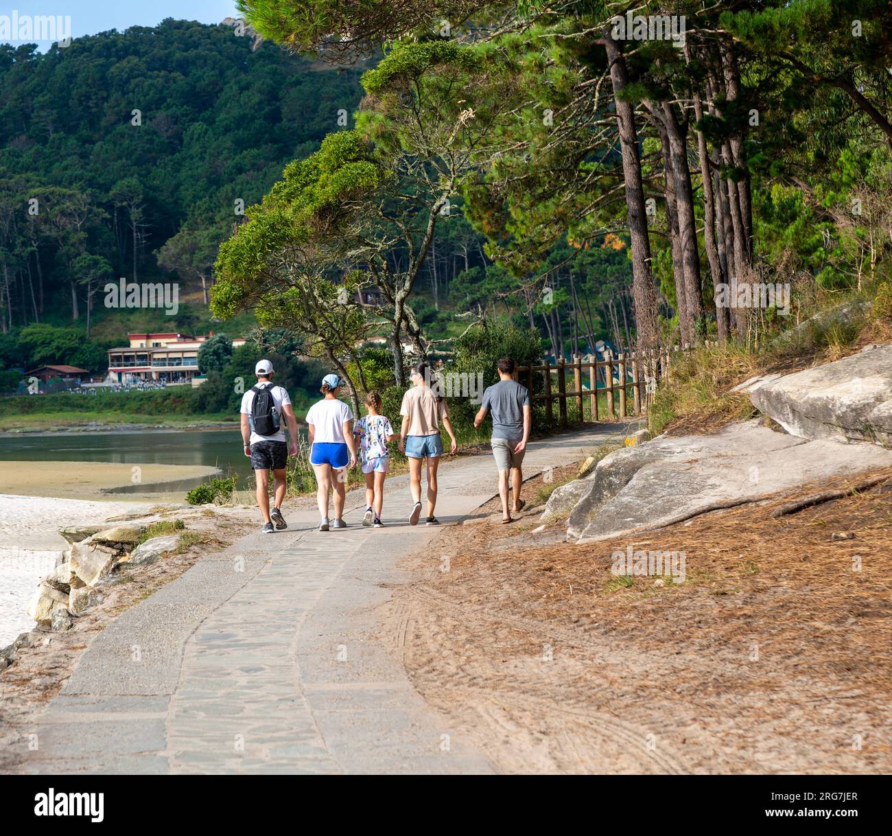 Family group walking on pathway, Cies Islands, Atlantic Islands Galicia ...