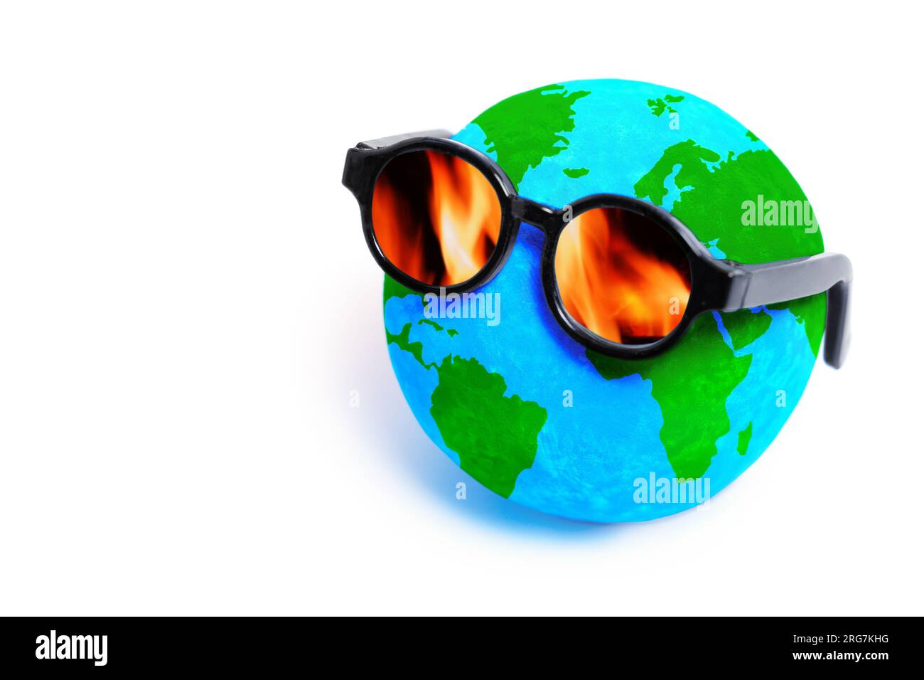 Globe model wearing sunglasses with lenses that reflect vibrant flames ...
