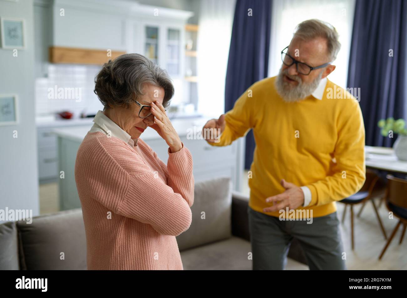 Angry elderly husband shouting on elderly upset wife Stock Photo - Alamy
