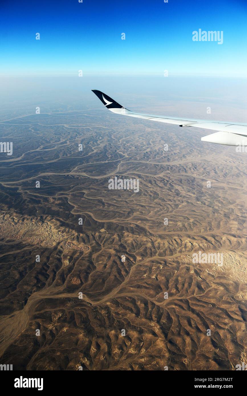 Flying with Cathay Pacific over the deserts of Jordan and Saudi Arabia ...