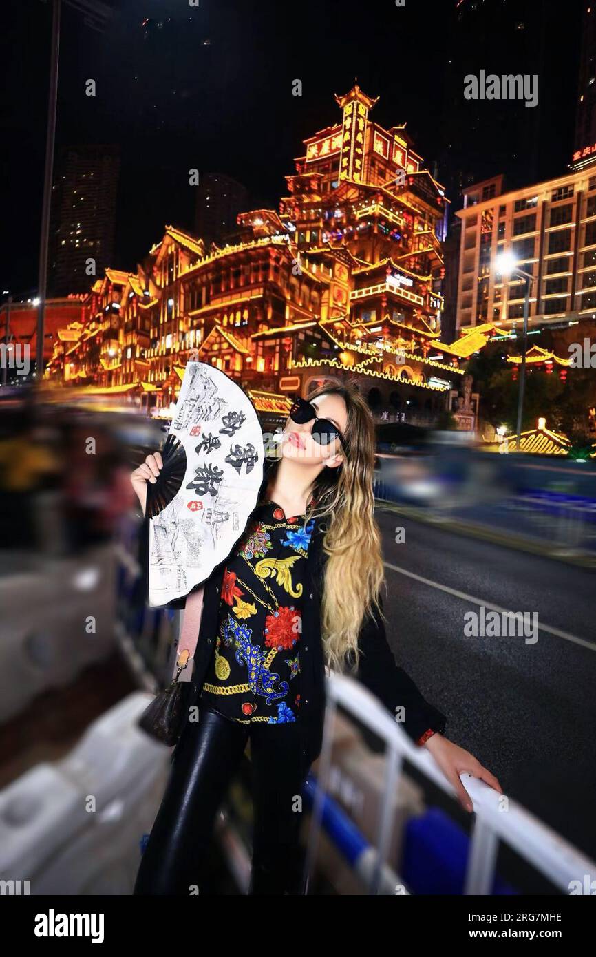 Chongqing. 8th Aug, 2023. Yasmin Von Roon poses for photos in front of ...