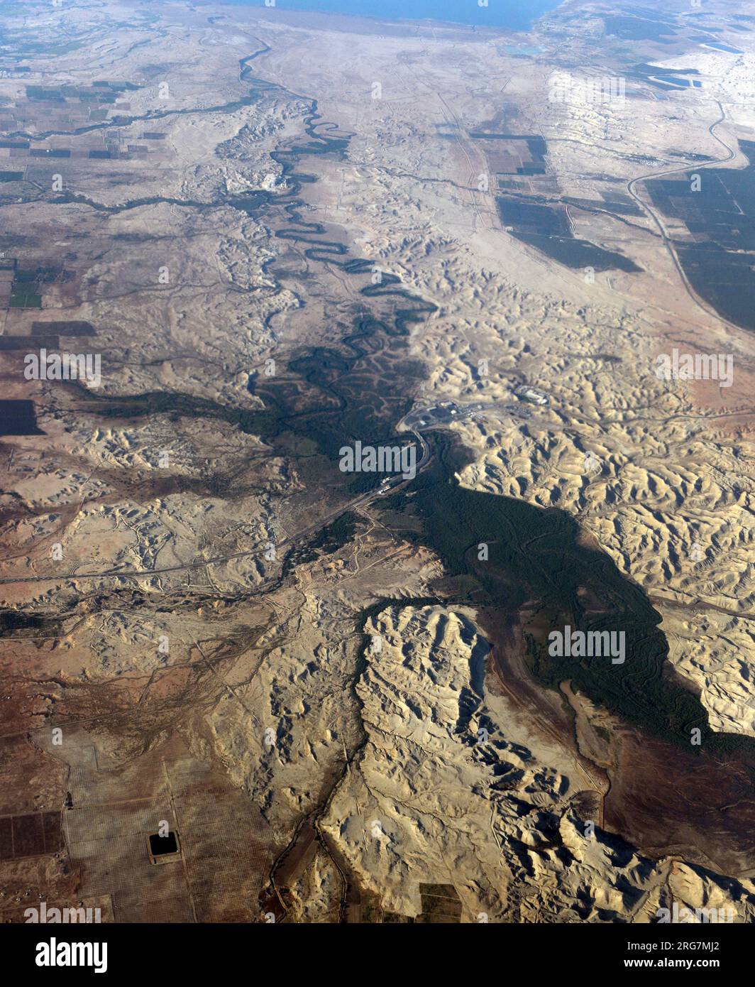 An aerial view of the Jordan river and the Dead Sea in Jordan and ...