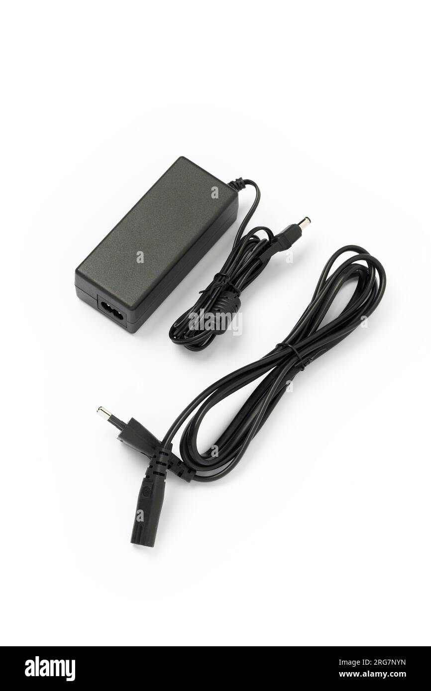 Power supply and cable isolated on white. European standard Stock Photo ...