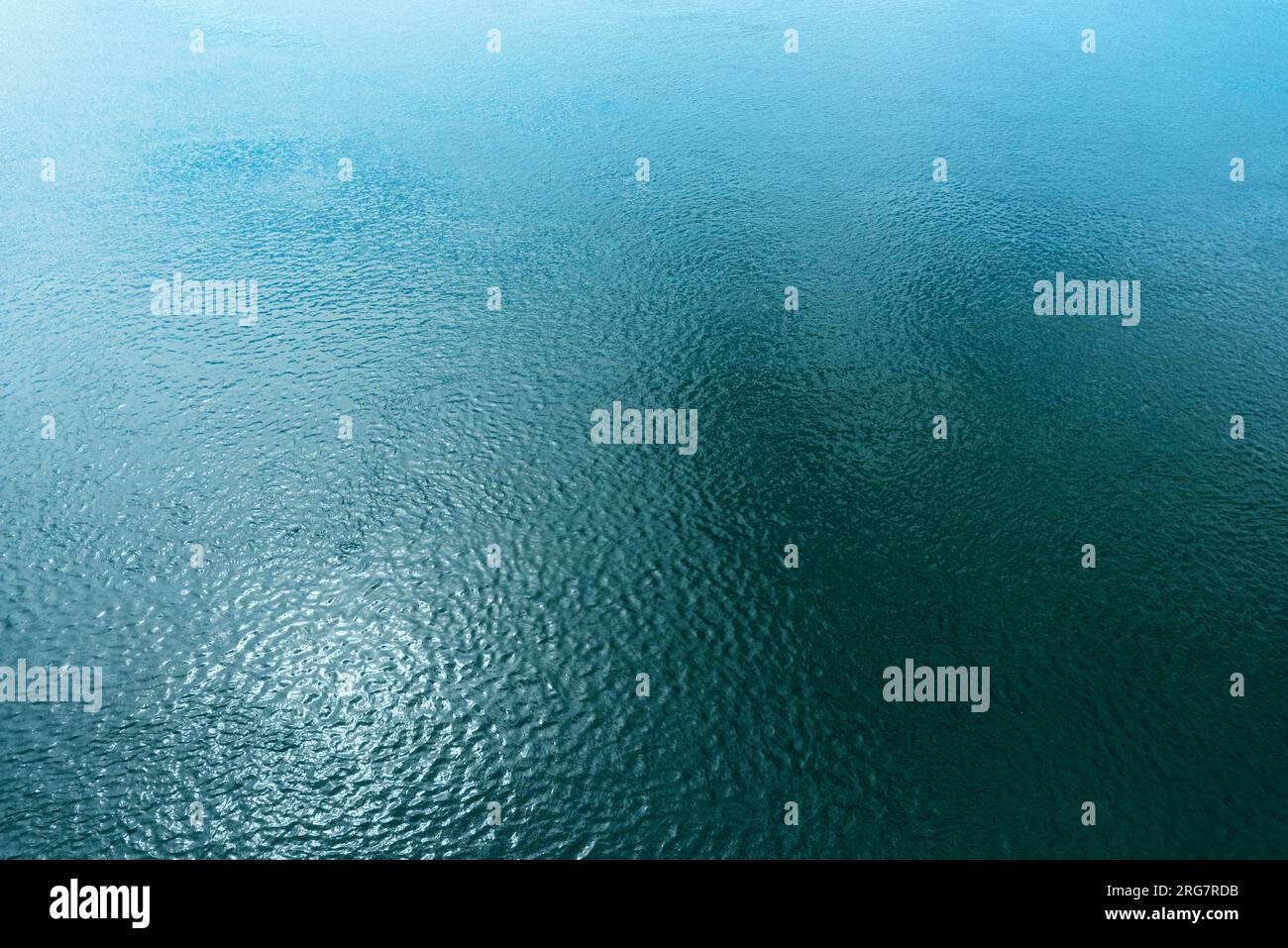 Blue water of Danube river during clear and sunny day. Rippled texture ...