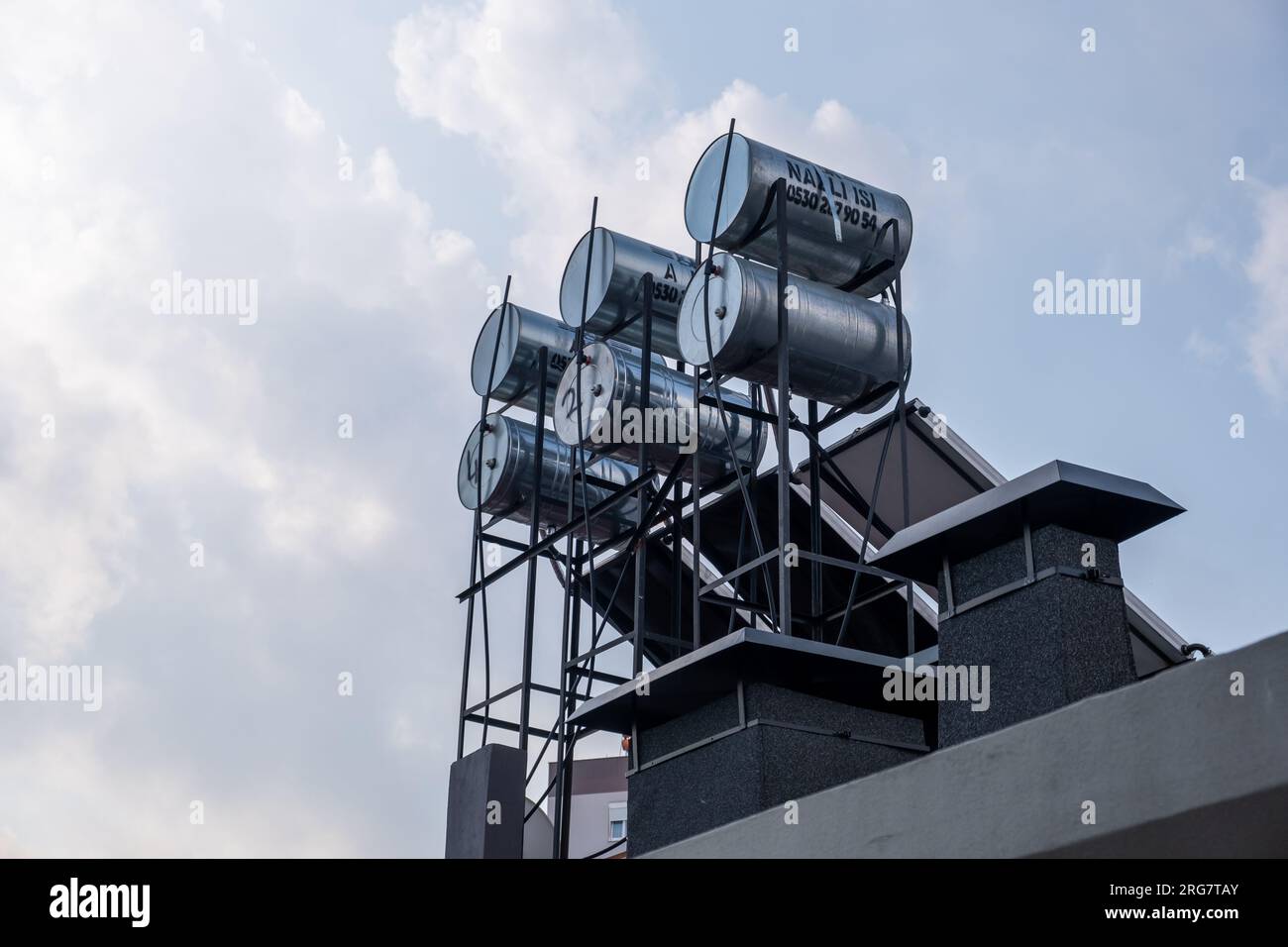 Water tanks on the roof of a residential building in Antalya Stock ...