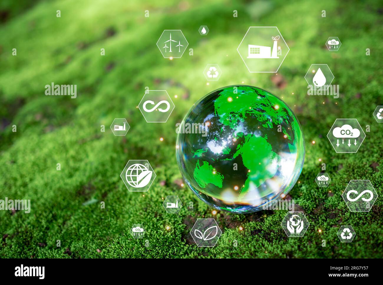 Crystal ball on moss in green forest. CO2 emission reduction concept ...