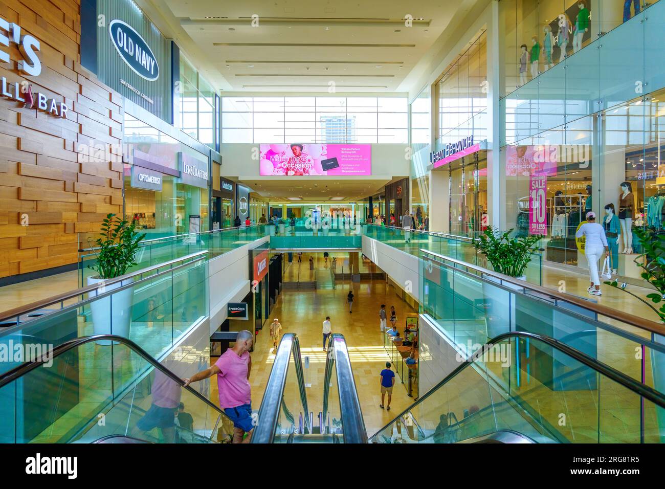 Mississauga, Canada, People at the entrance. Symmetry of escalators and ...