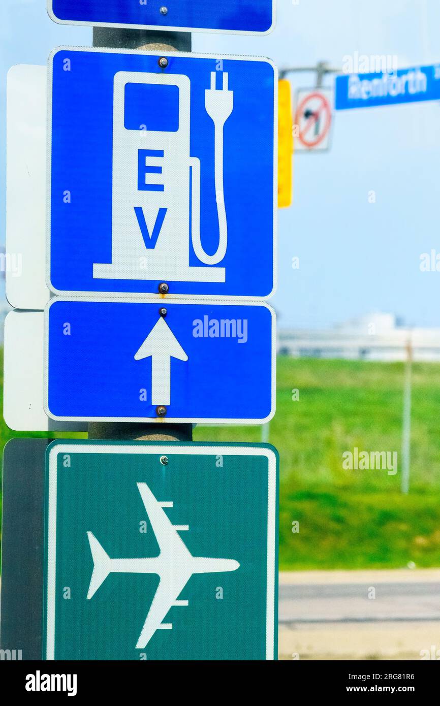 Toronto, Canada, Road sign indicating an electric vehicle charging ...