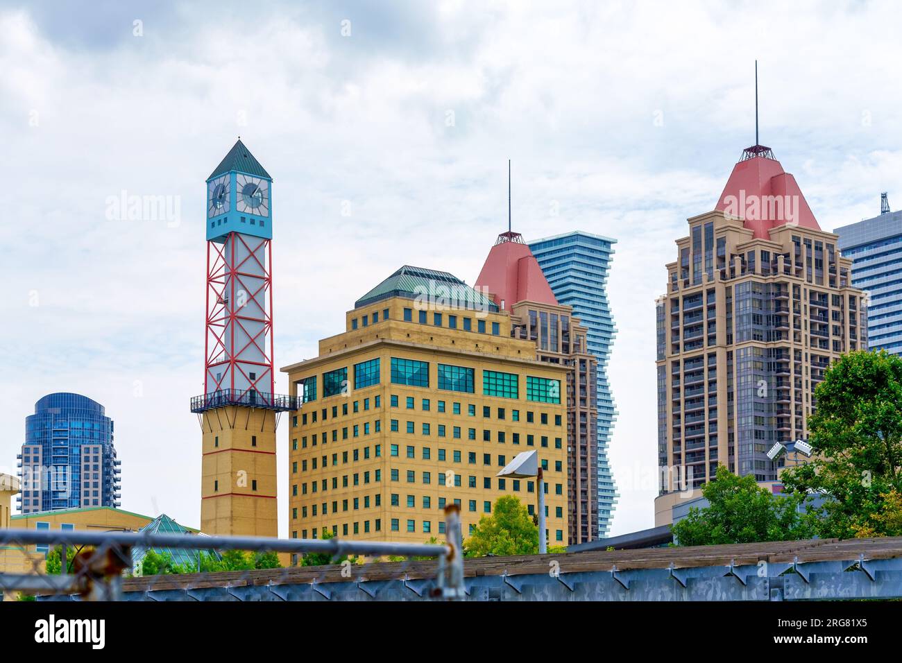 Mississauga, Canada, Clock tower and modern residential buildings in ...