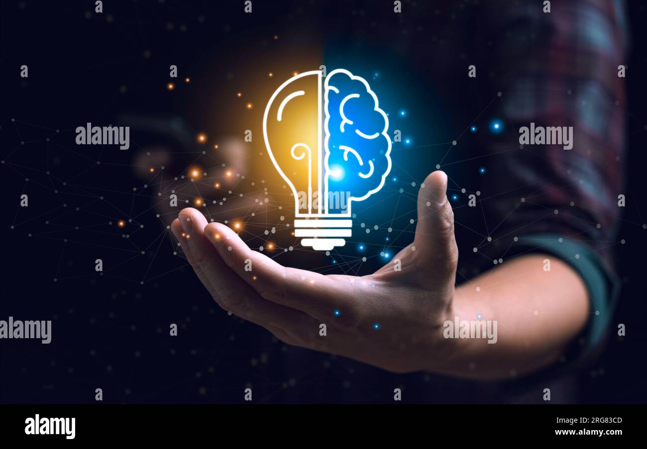 Smart thinking idea and inspiration innovation concept. businessman holding half brain icon and ...