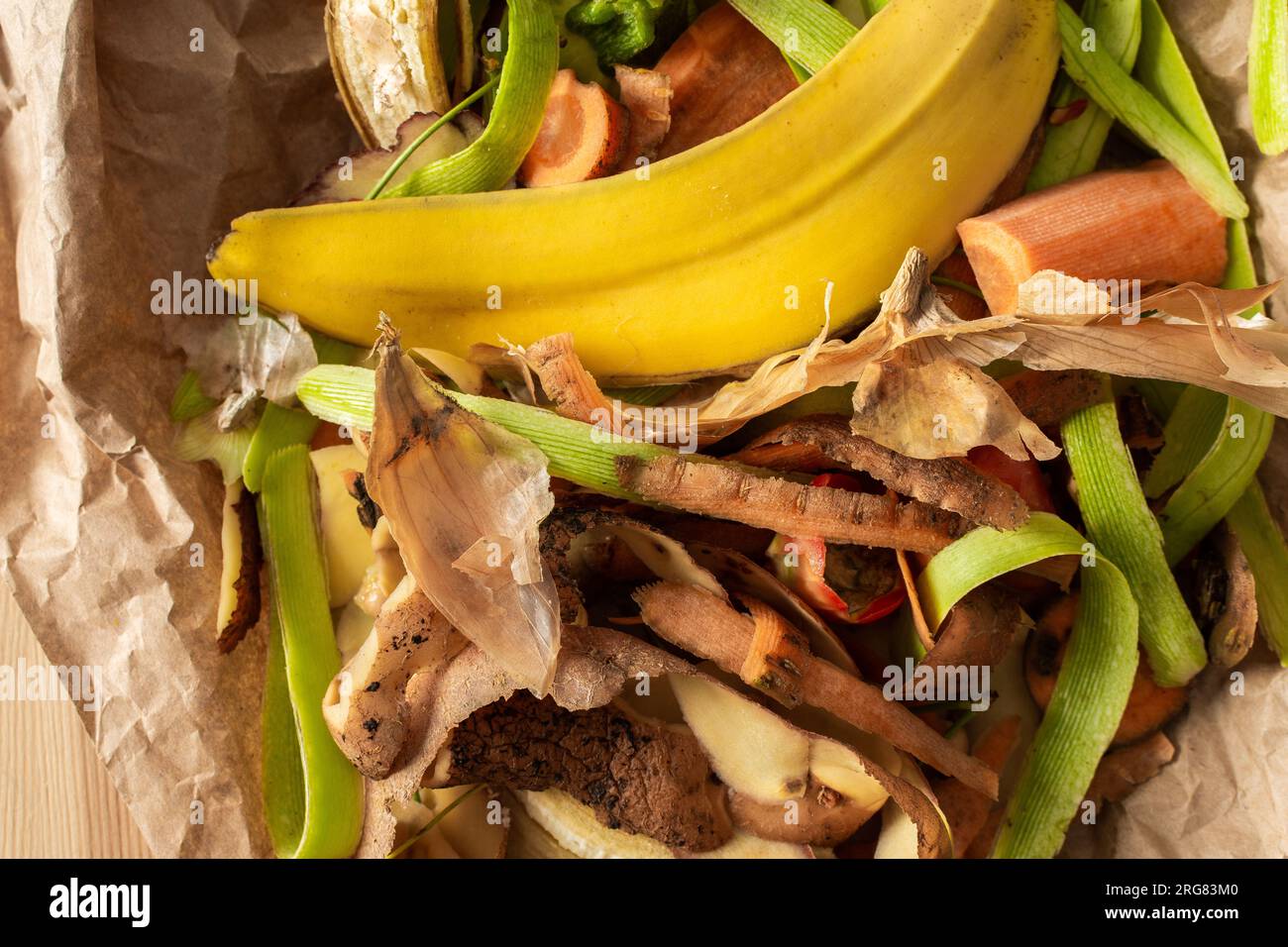 Food organic waste on eco friendly parchment paper, fruit and vegetable ...