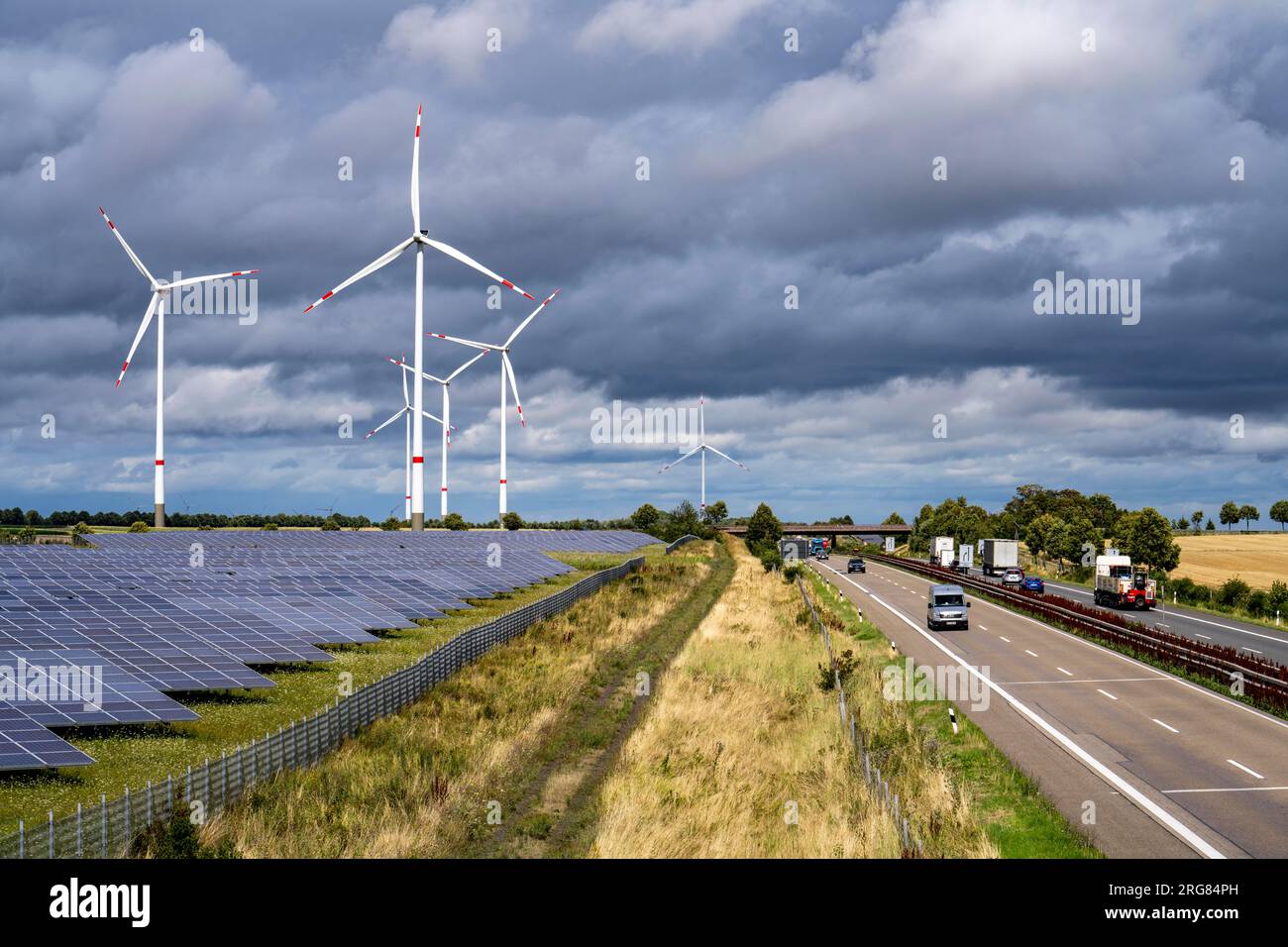 Solar park and wind farm near the village of Morschheim, on the A63 ...