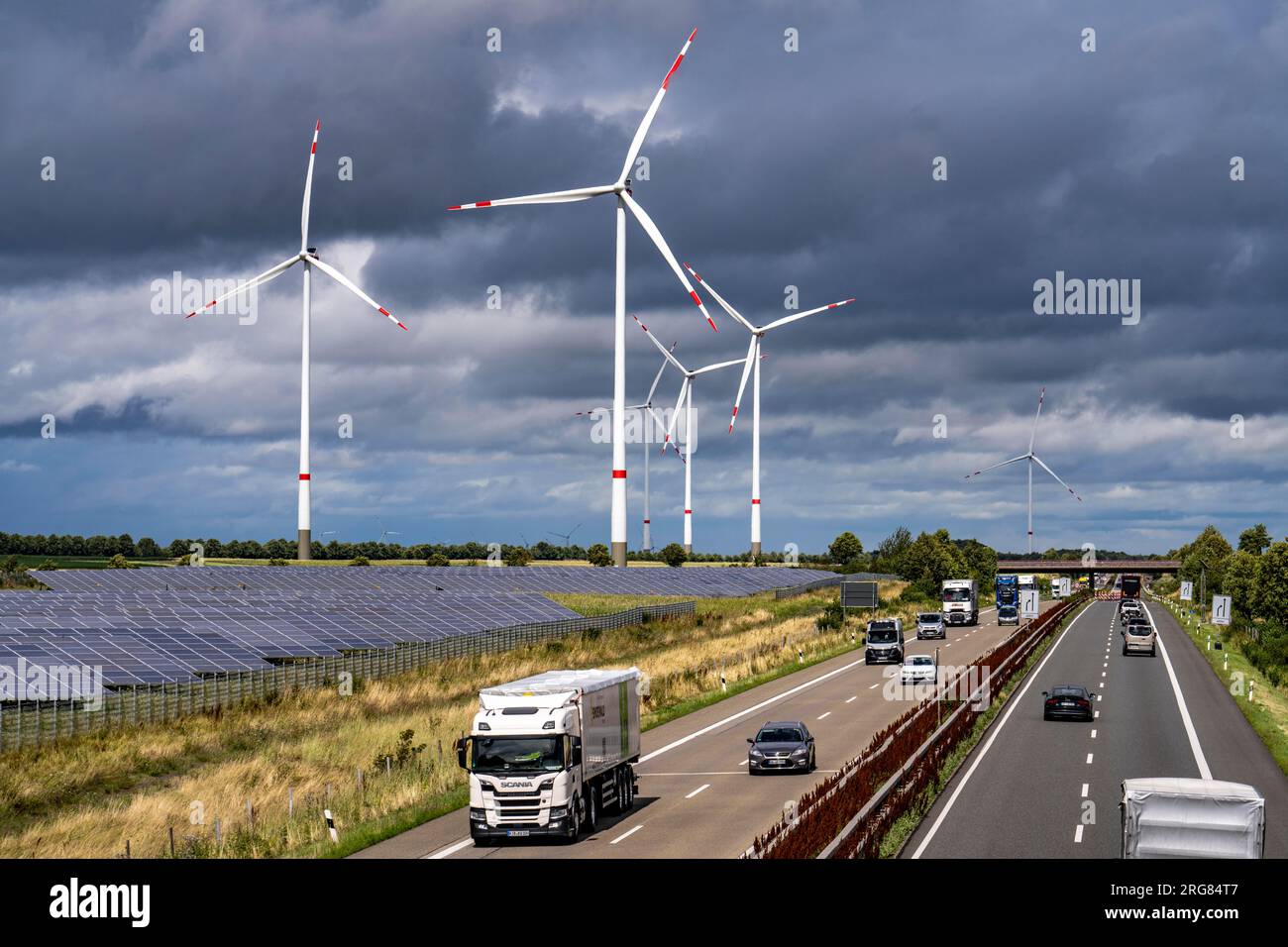 Solar park and wind farm near the village of Morschheim, on the A63 ...