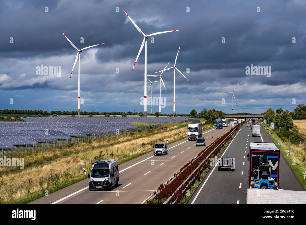 Solar park and wind farm near the village of Morschheim, on the A63 ...