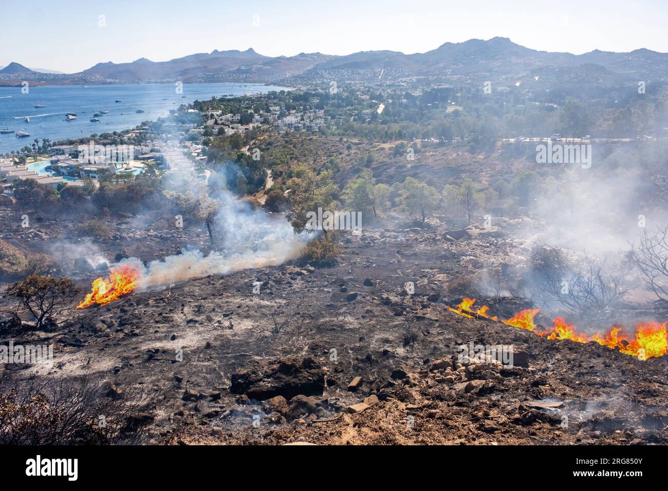 Dangerous flame tongues and smoke moving towards village at Aegean ...
