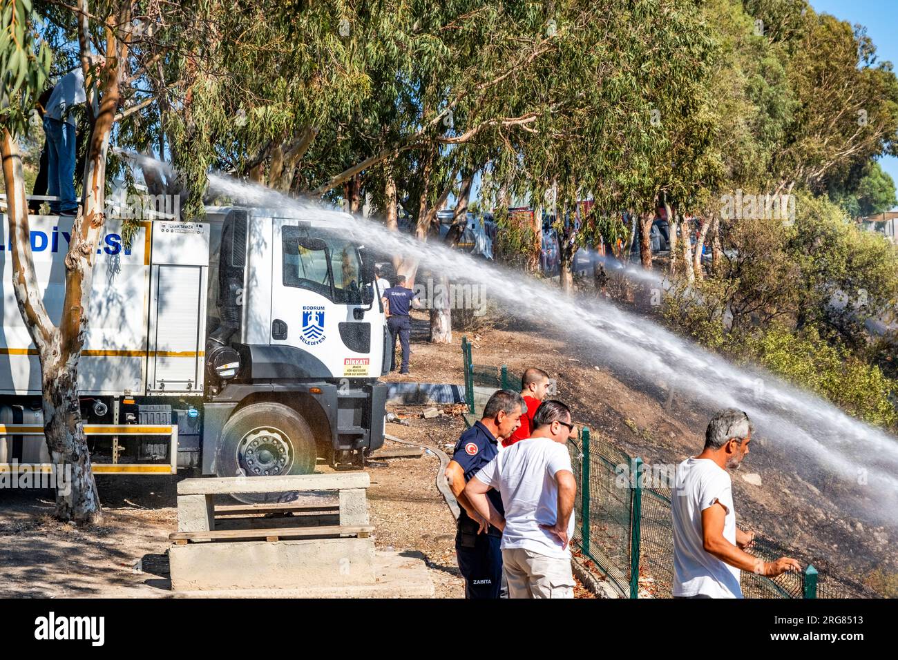 Bodrum,Turkey, 08.08.2023: People watching fire departmend ...