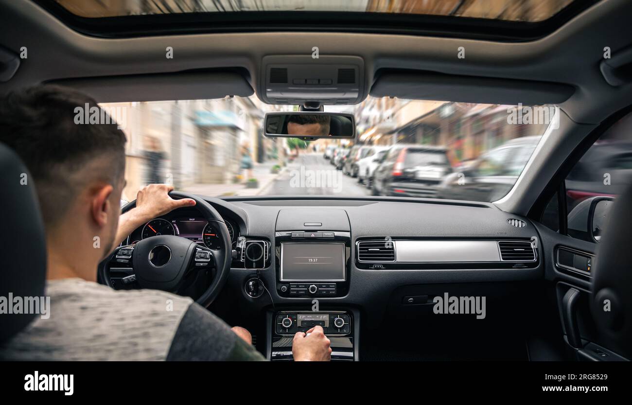 Hands on the wheel when driving at high speed from inside the car Stock ...