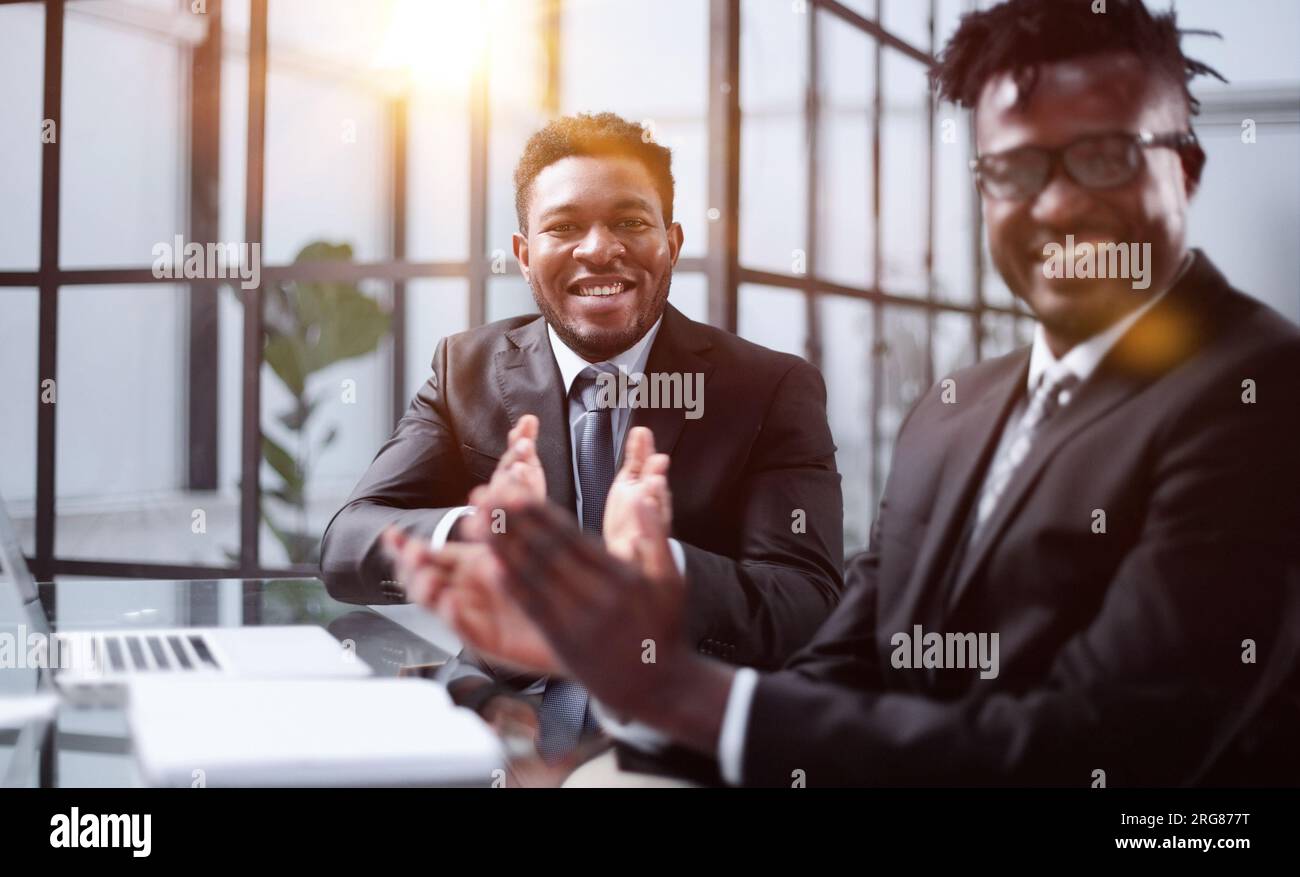 Middle aged businessman laptop clapping hi-res stock photography and ...