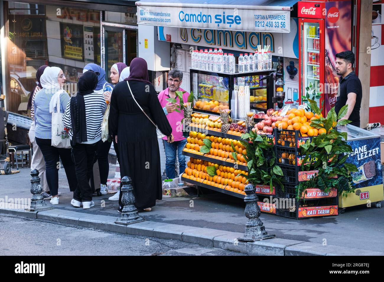 Istanbul, Turkey, Turkiye. Turkish Women Standing by an Orange Juice ...