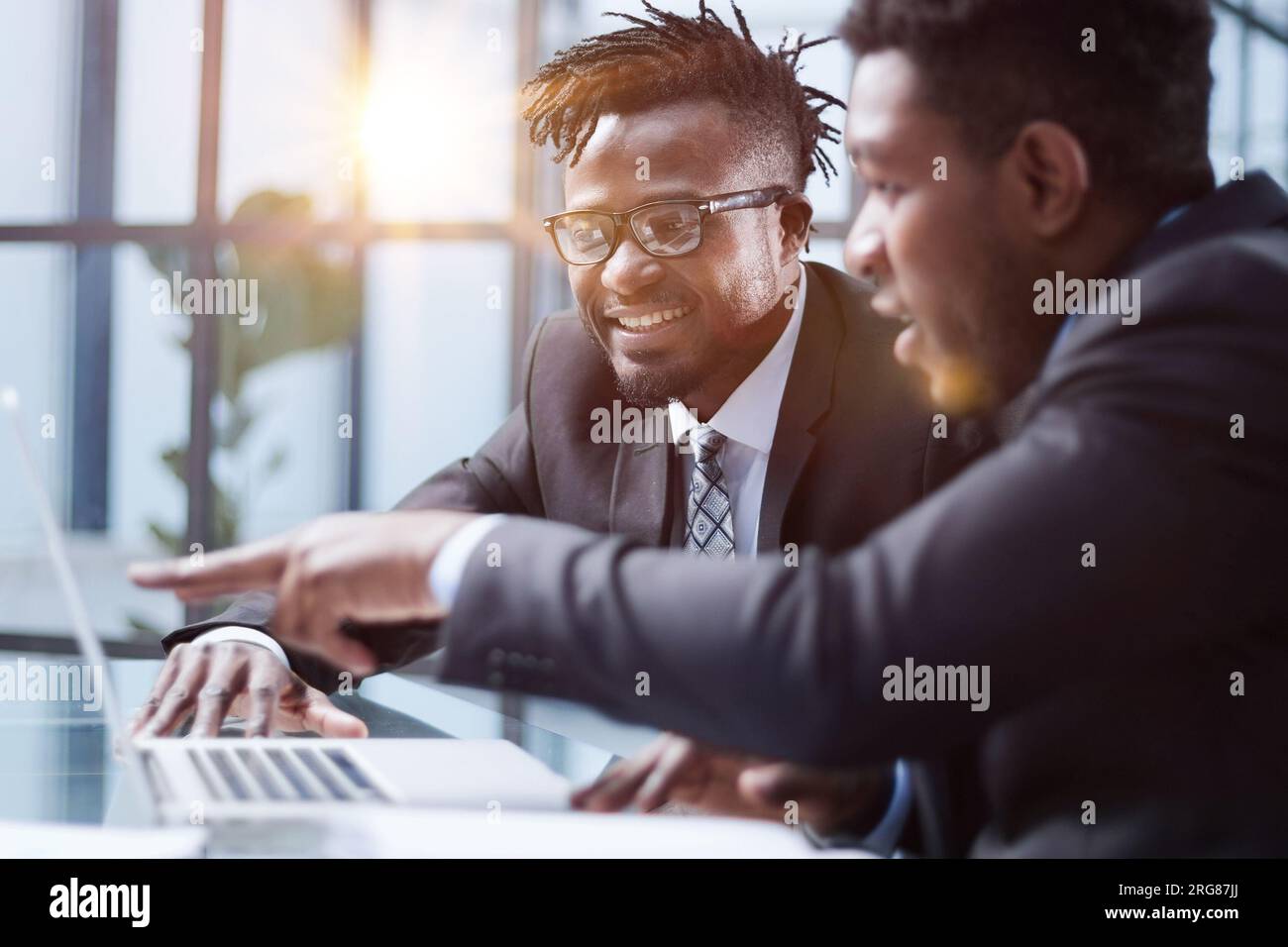 African american boss negotiating discussing contract details with ...