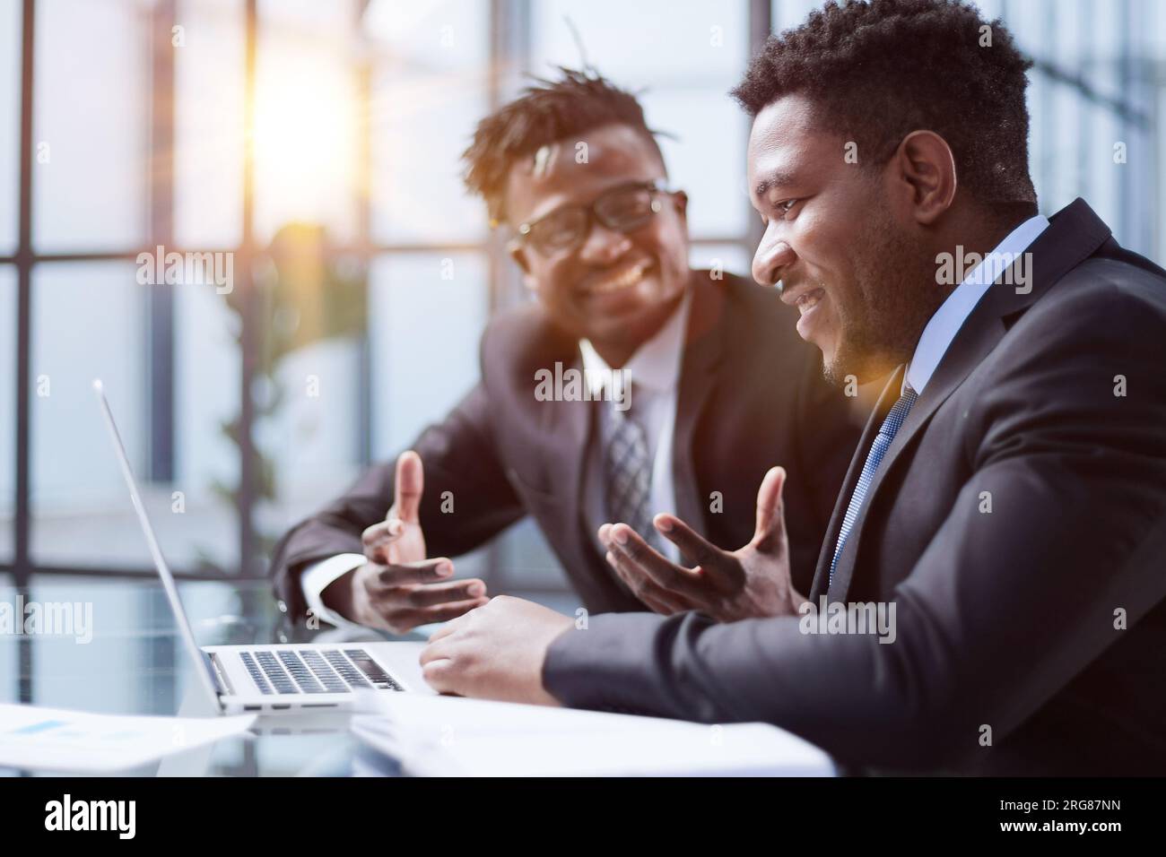 African american boss negotiating discussing contract details with ...