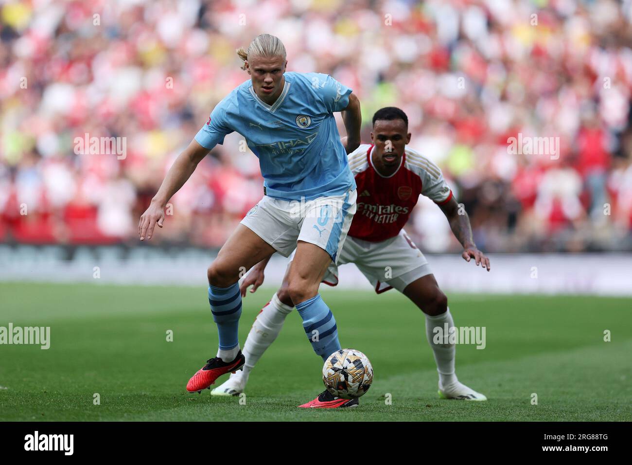 London, UK. 06th Aug, 2023. Erling Haaland of Manchester City holds off ...
