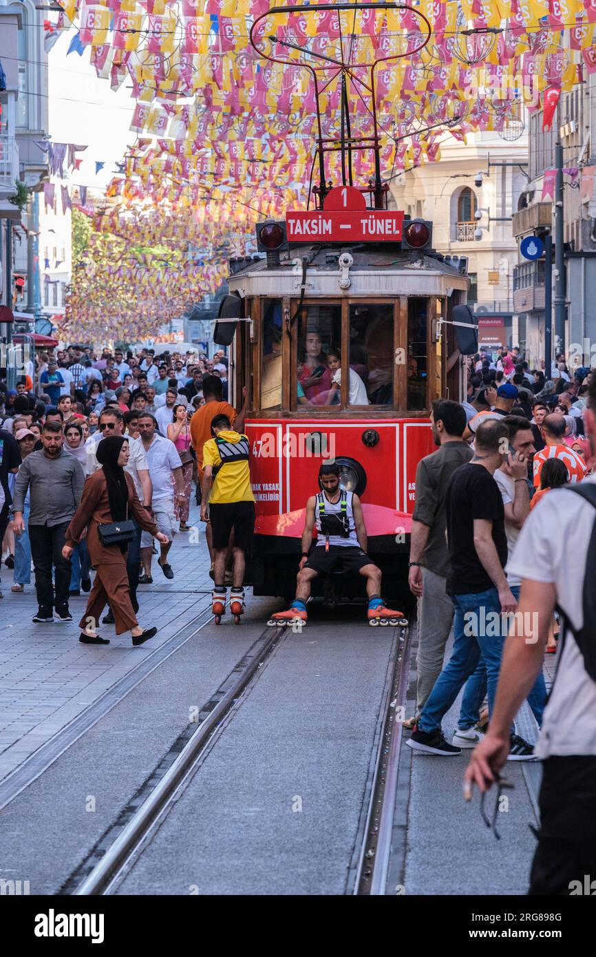 Istanbul, Turkey, Türkiye. Istiklal Street, Skaters Hitching a Ride as ...
