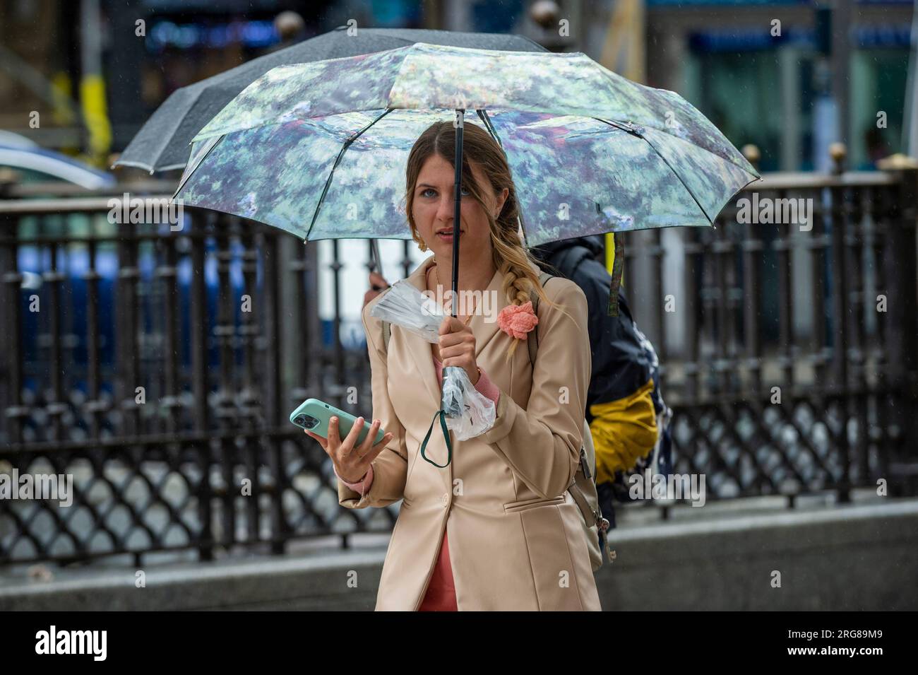 Woman Caught In The Rain