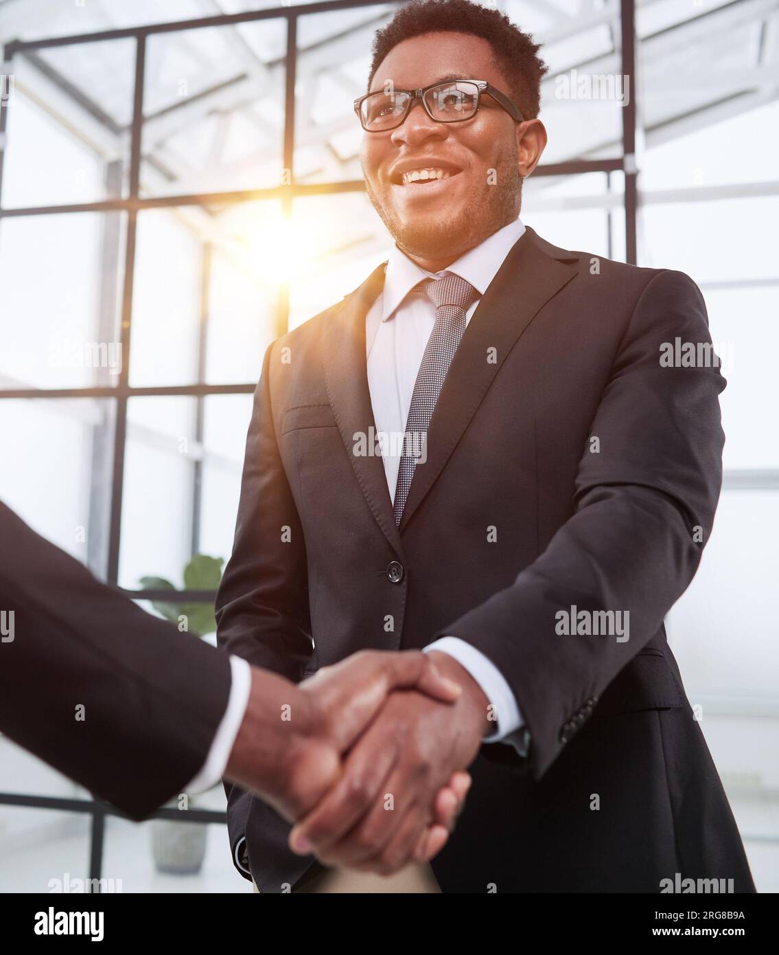 Two business men shaking hands together after successful meeting Stock ...