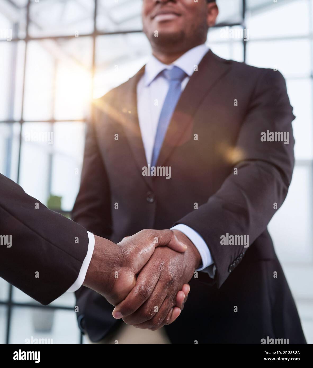 Two business men shaking hands together after successful meeting Stock ...